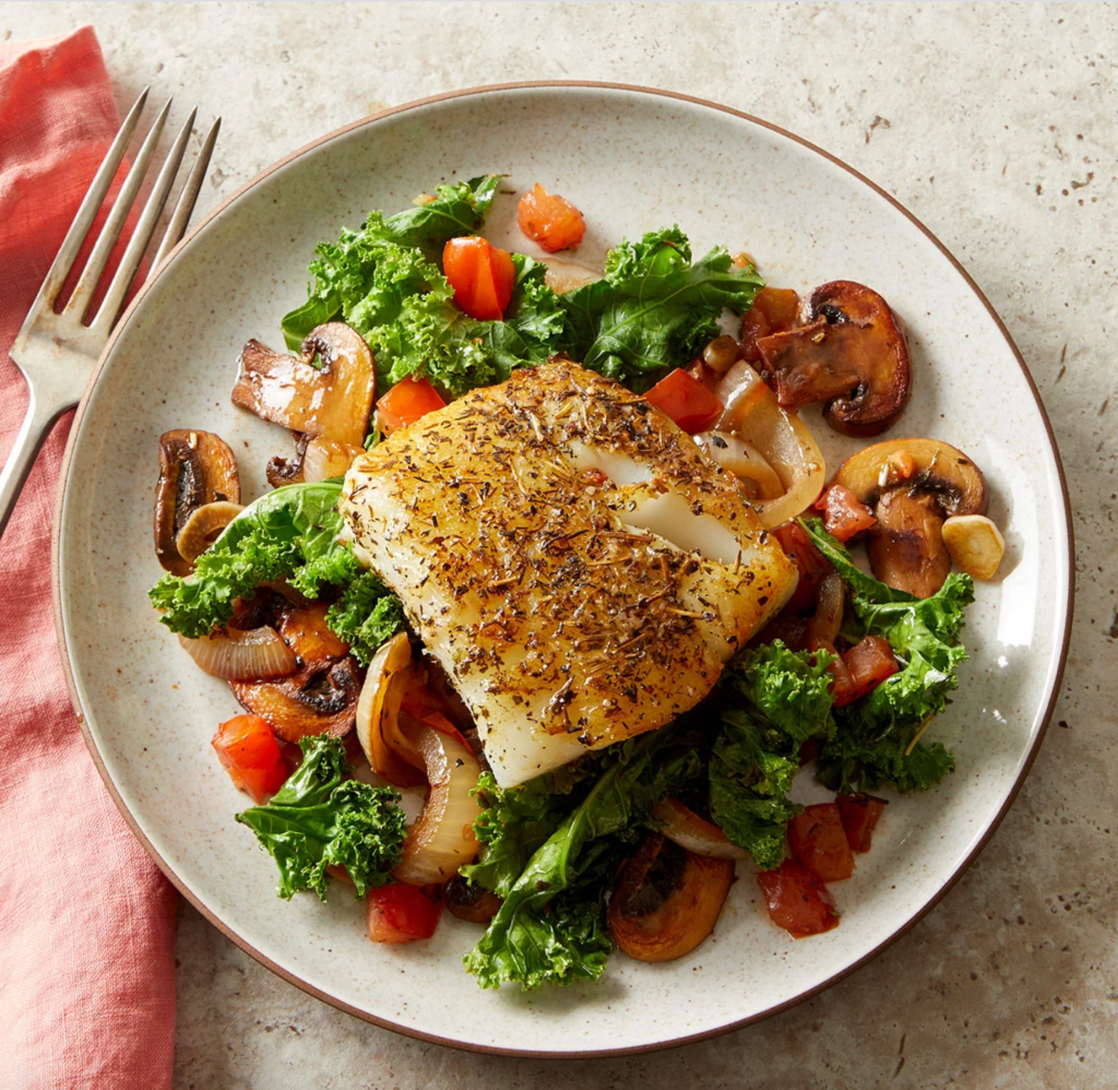 Herby Mediterranean Fish with Wilted Greens & Mushrooms